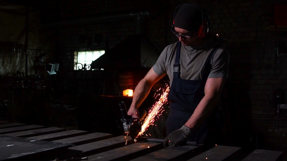 Industrial Engineer Working on Cutting Steel with Compound Mitre Saw ...