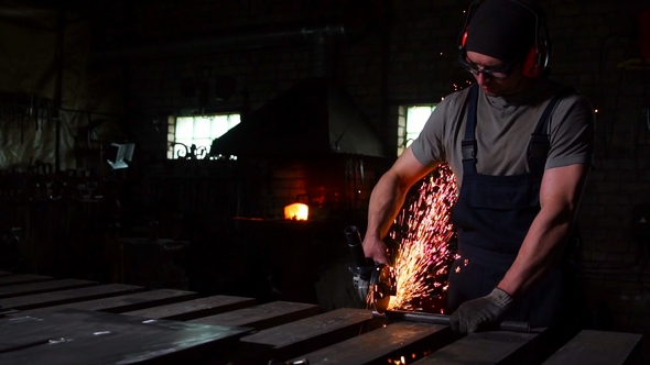Industrial Engineer Working on Cutting Steel with Compound Mitre Saw ...