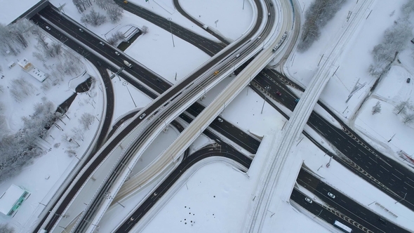 Aerial View of a Freeway Intersection Snow-covered in Winter, Stock Footage