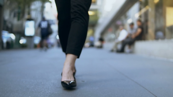 View of Female Feet Walking Through the Downtown. Businesswoman Wearing ...