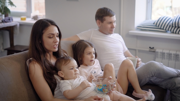 Mom and Dad Spending Time with Kids on Sofa, Stock Footage | VideoHive