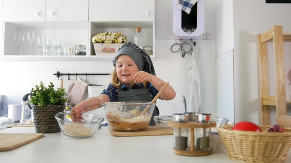 Little Girl Adds Ingredients To the Pastry Dough, Stock Footage | VideoHive