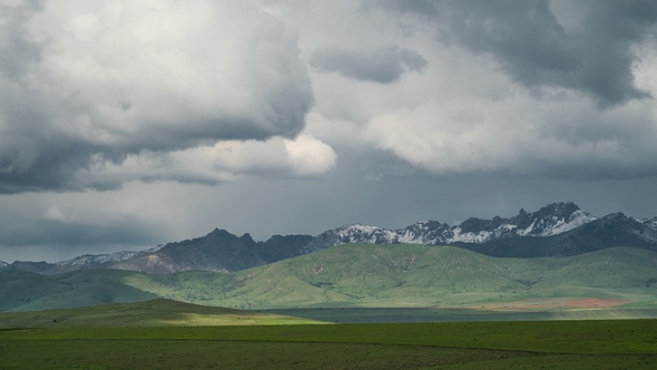 Sky with Clouds Over Beautiful Valley Between the Mountains and Green ...