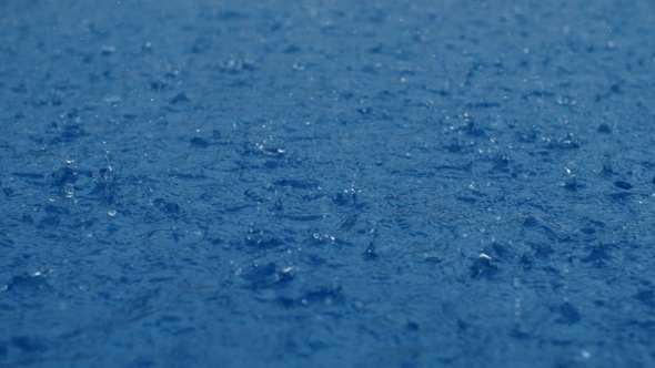 Heavy Rain on Pure Blue Water, Stock Footage | VideoHive