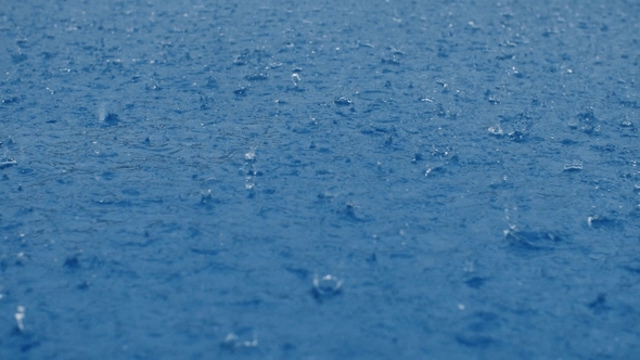 Heavy Rain on Blue Water., Stock Footage | VideoHive