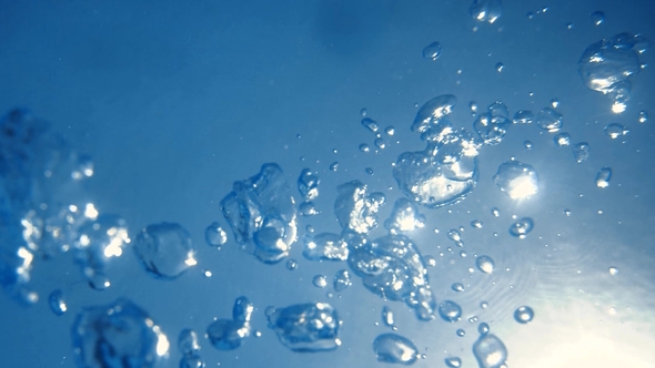 Air Bubbles Rising Up To Surface in Blue Pure Ocean. Sunshine ...