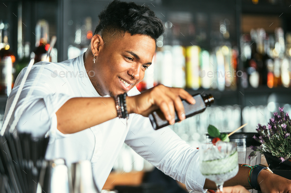 Smiling bartender serving cocktail Stock Photo by Click_and_Photo ...