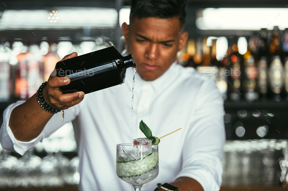 Barman adding alcohol Stock Photo by Click_and_Photo | PhotoDune
