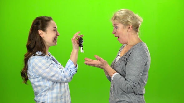 Girl Gives the Keys To Her Mom. Green Screen, Stock Footage | VideoHive