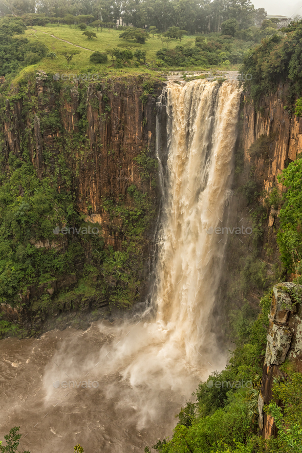 Flooded Umgeni River plunges 95 m down the Howick Falls Stock Photo by ...