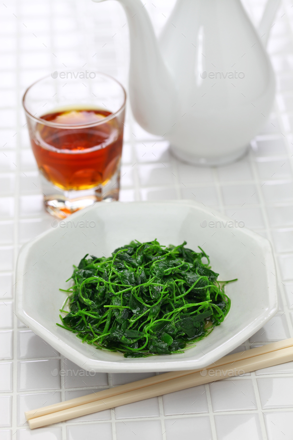 chinese white wine stir fried with toothed bur clover Stock Photo by ...