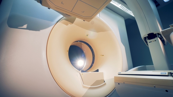 Scanning Elements of Tomographic Machine Are Moving Apart and Turning ...