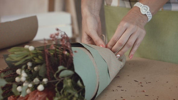 Florist Packing Festive Bouquet in Wrapping Paper, Stock Footage ...