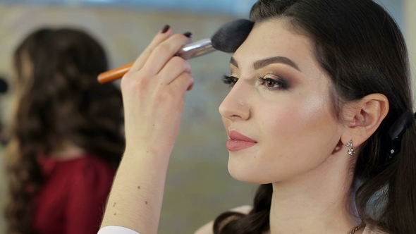 Make-up Artist Doing Make-up for Beautiful Girl., Stock Footage | VideoHive