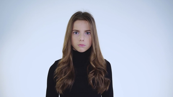 Portrait of Shocked Guilty Girl Raising Hands on Background, Stock Footage
