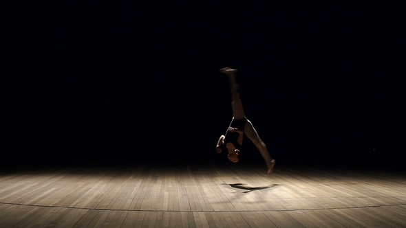 Girl Makes a Gymnastic Somersault on Stage. Ballet, Stock Footage ...