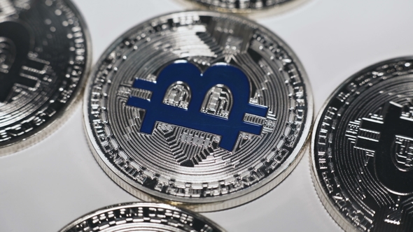 Cryptocurrency, Silver Bitcoins Rotating on the White Background, Stock ...