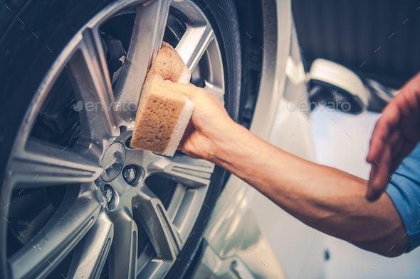 Men Cleaning Car Alloy Wheel Stock Photo by duallogic | PhotoDune