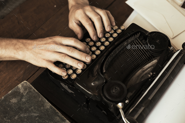 Young man's hands typing on an antique vintage typewriter Stock Photo ...