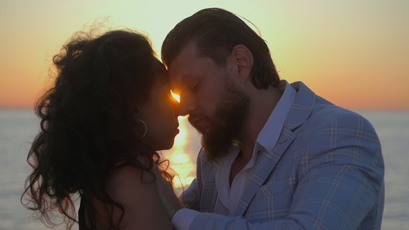 Portrait of Young Attractive Couple Dancing Latin Bachata Near Sea or Ocean. Sunlight Background ...