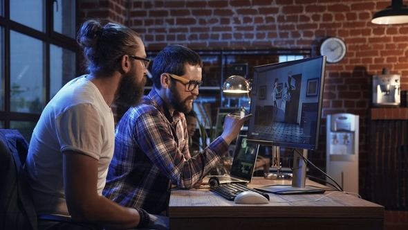 Men Creating Cartoon on Computer, Stock Footage | VideoHive