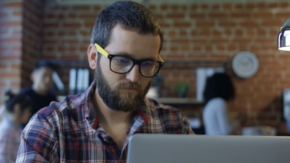 Focused Bearded Man Using Computer, Stock Footage | VideoHive