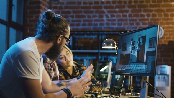 Men Creating Cartoon on Computer, Stock Footage | VideoHive