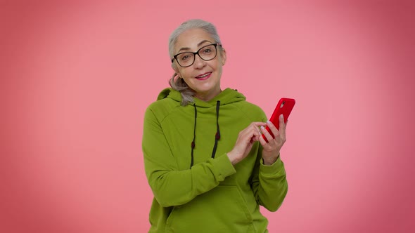 Senior Old Granny Woman Using Mobile Phone Typing New Post Sms Message ...