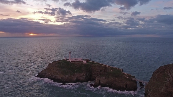 Aerial View of South Stack with Lighthouse During Sunset, Stock Footage
