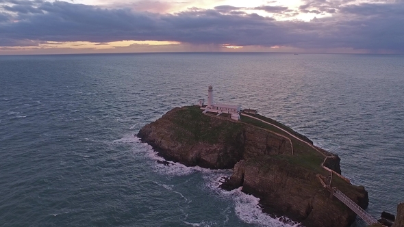 Aerial View of South Stack with Lighthouse During Sunset, Stock Footage