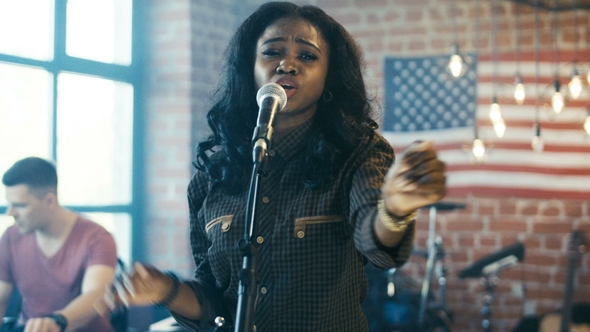 Expressive Singer with Band on Stage, Stock Footage | VideoHive