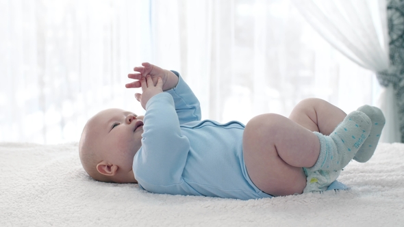 Little Baby Lying on a Back, Stock Footage | VideoHive