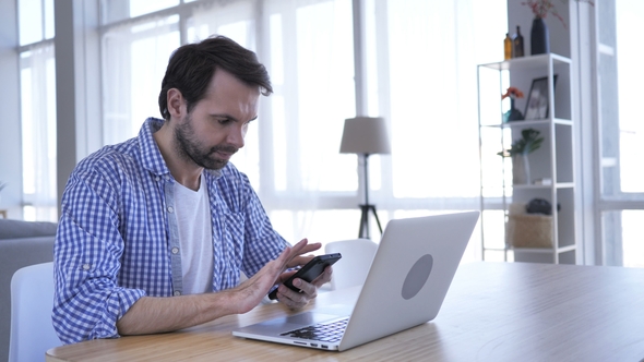 Casual Beard Man Browsing Internet on Smartphone, Stock Footage | VideoHive