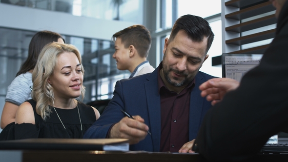 Successful Family Signing Papers for Car Purchase, Stock Footage ...