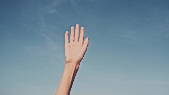 People Rasing Hands on Blue Sky Background, Stock Footage | VideoHive