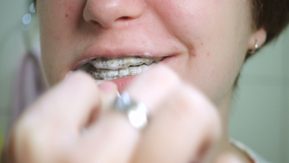 Teenager Girl Cleaning Her Teeth, Stock Footage | VideoHive