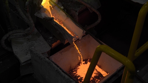 Hot Steel Pouring at Steel Plant. In the Frame, Molten Metal Is Poured ...