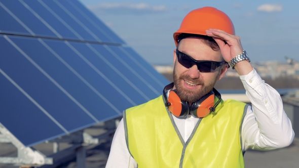 Engineer Portrait. Smiling Worker Is Turning His Head and Slightly ...