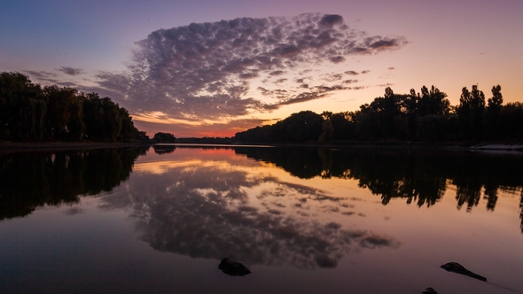 Lake in Spring at Dawn Reflection of Clouds in Water, Stock Footage