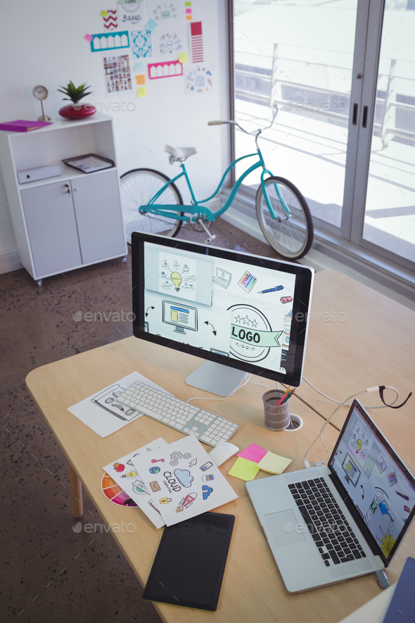 Technologies with drawings on desk in creative office Stock Photo by ...