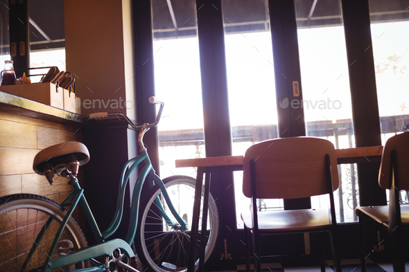 Bicycle at counter in restaurant Stock Photo by Wavebreakmedia | PhotoDune