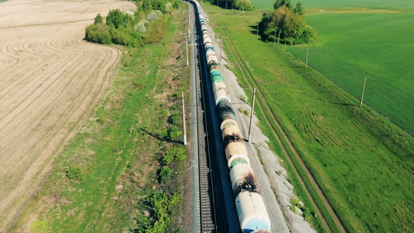 A Long Train Set Goes on a Railway Top View Aerial View of Train at ...