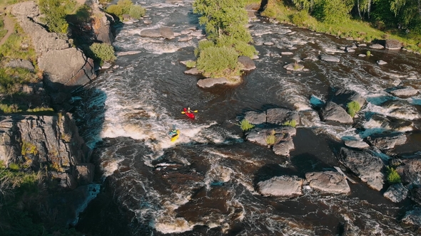 Overhead Aerial Shot of Rafting Boat on Raging Mountain River with ...
