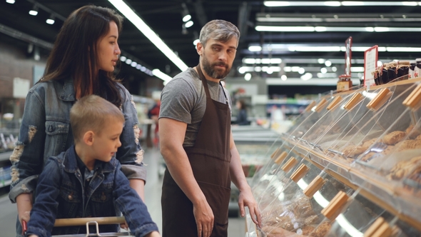 Shop Assistant Is Working in Bakery Department in Supermarket Then ...