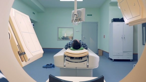 Start of a Tomographic Procedure Held in an Equipped Medical Room ...