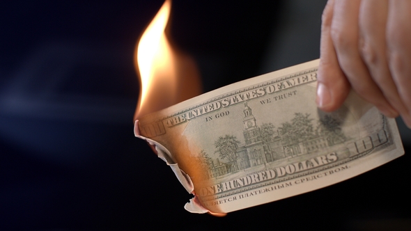 Male Hand Burning Dollar Banknote. Man Burning Money Cash. Financial ...
