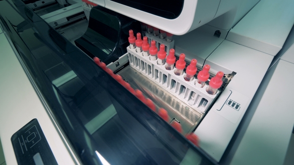 Plastic Sample Tubes Move on a Automated Pharmacutical Line by ABC-video