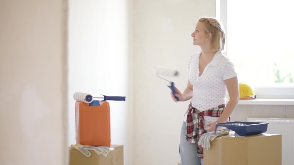 Woman Makes Repairs in Flat, Stock Footage | VideoHive