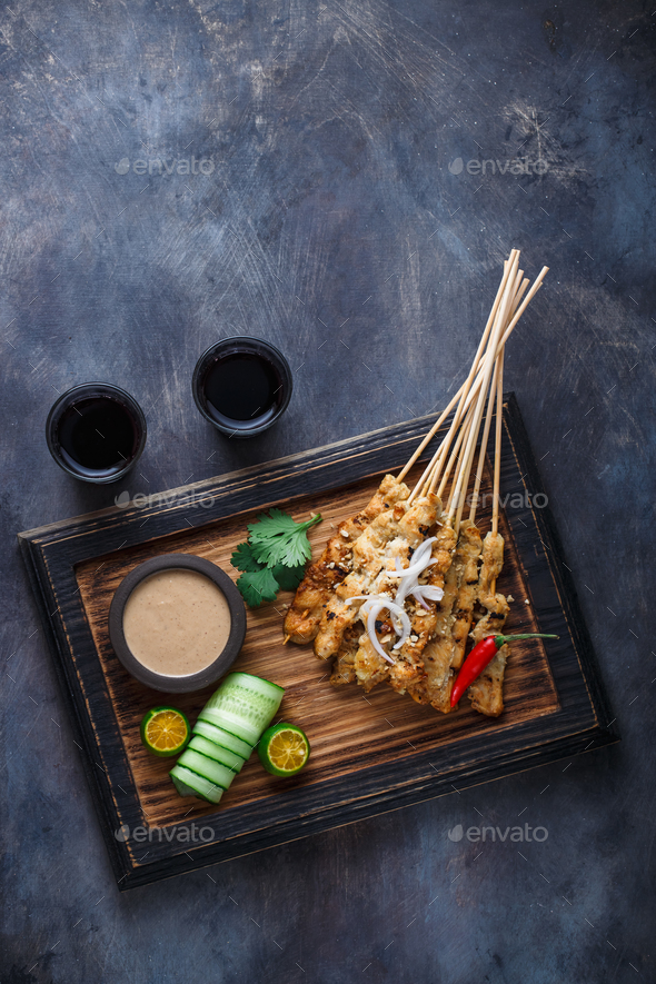 Chicken Satay or Sate Ayam - Malaysian famous food. Top view copyspace ...