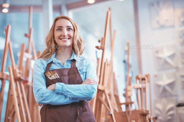 Smiling artist at easels Stock Photo by AboutImages | PhotoDune